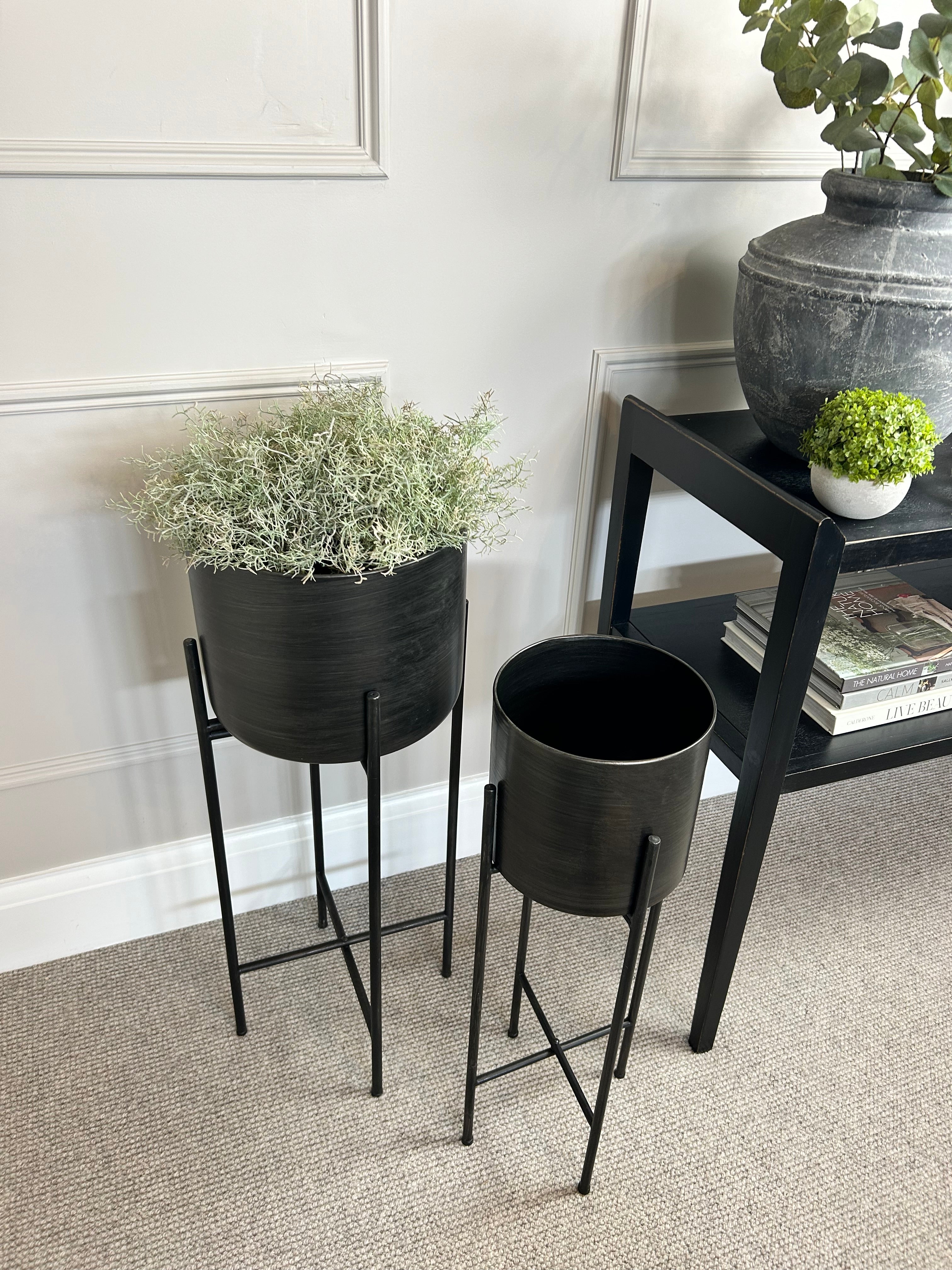 Tall metal plant stand store